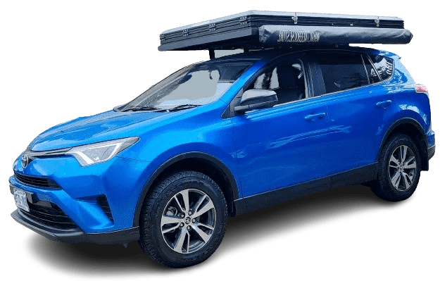 Side view of a blue Toyota RAV4 Camper, model year 2017 in front of a ...