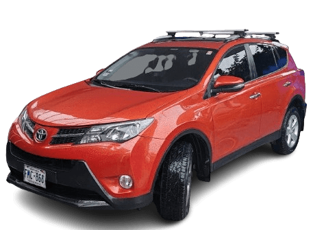 Side view of a red Toyota RAV4, model year 2017 in front of a ...