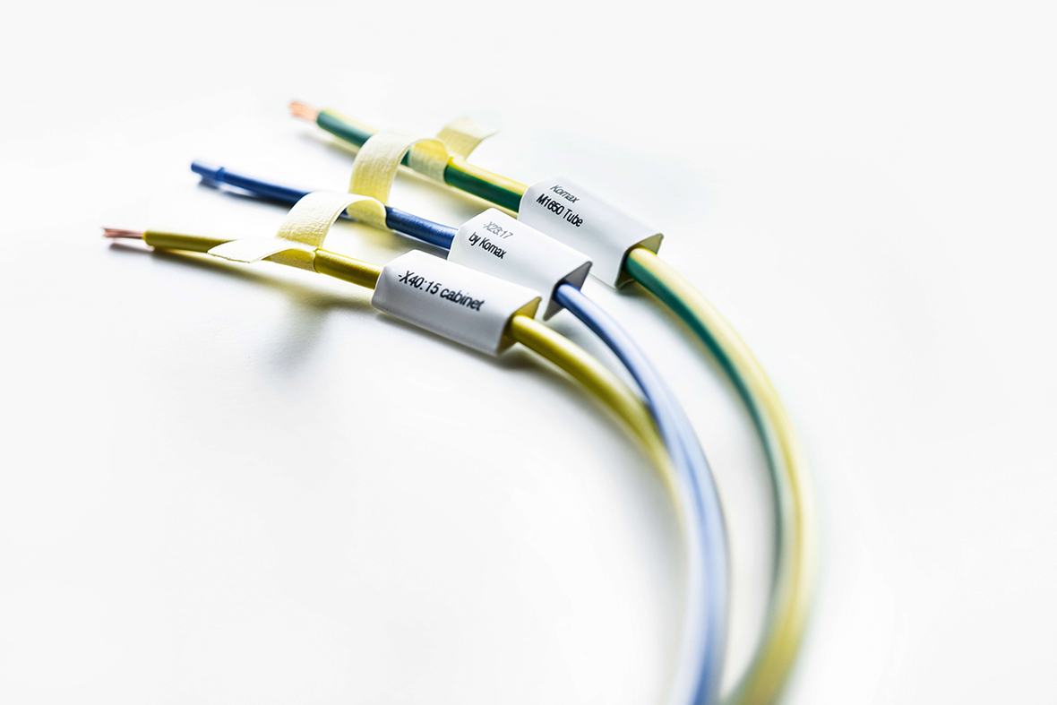 Fully automated tube marking with Komax M1650 Tube | Komax