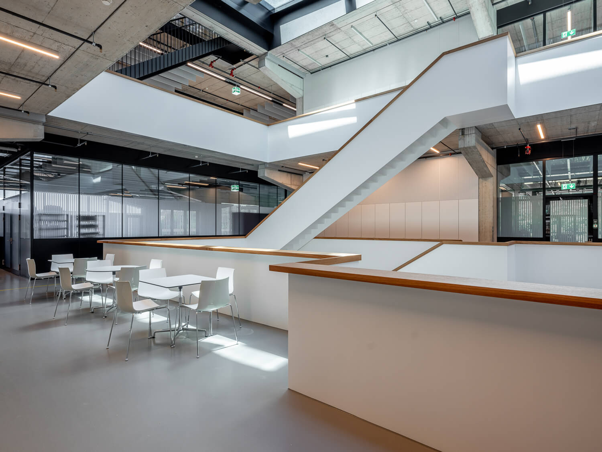 Vertical factory – Komax has moved into a groundbreaking new building ...