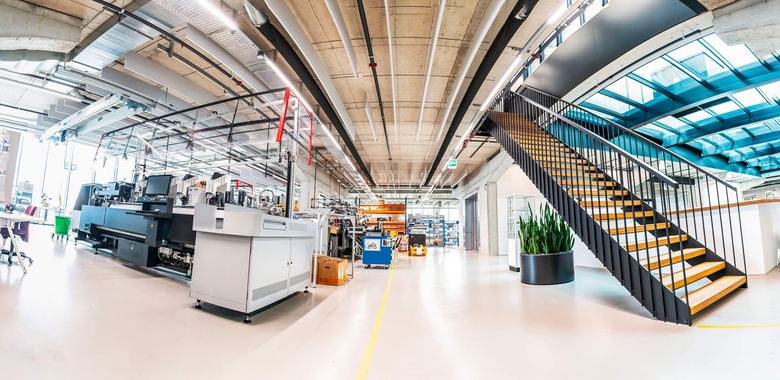 Vertical factory – Komax has moved into a groundbreaking new building ...