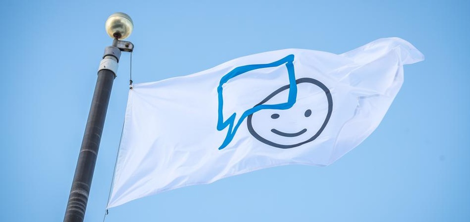 Flag raising ceremonies bring communities together on Bell Let’s Talk…